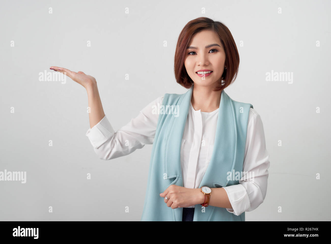 Business Woman presenting Product on her hand Isolated On White ...