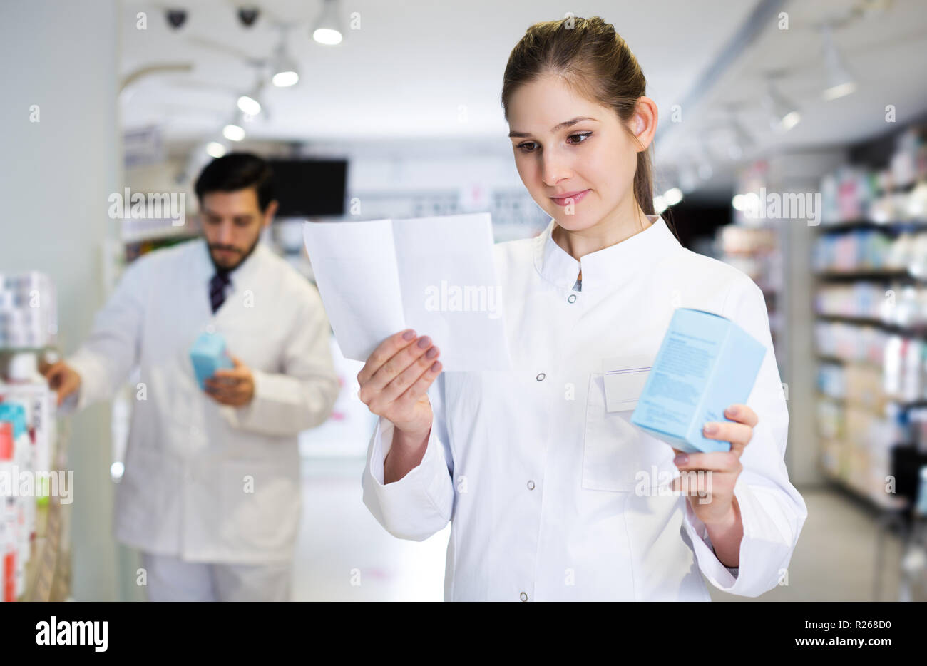 Female pharmacist work place hi-res stock photography and images - Alamy