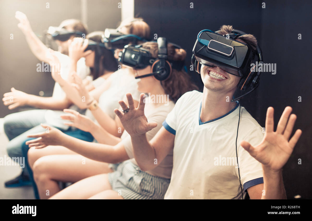Group young friends playing virtual hi-res stock photography and images ...