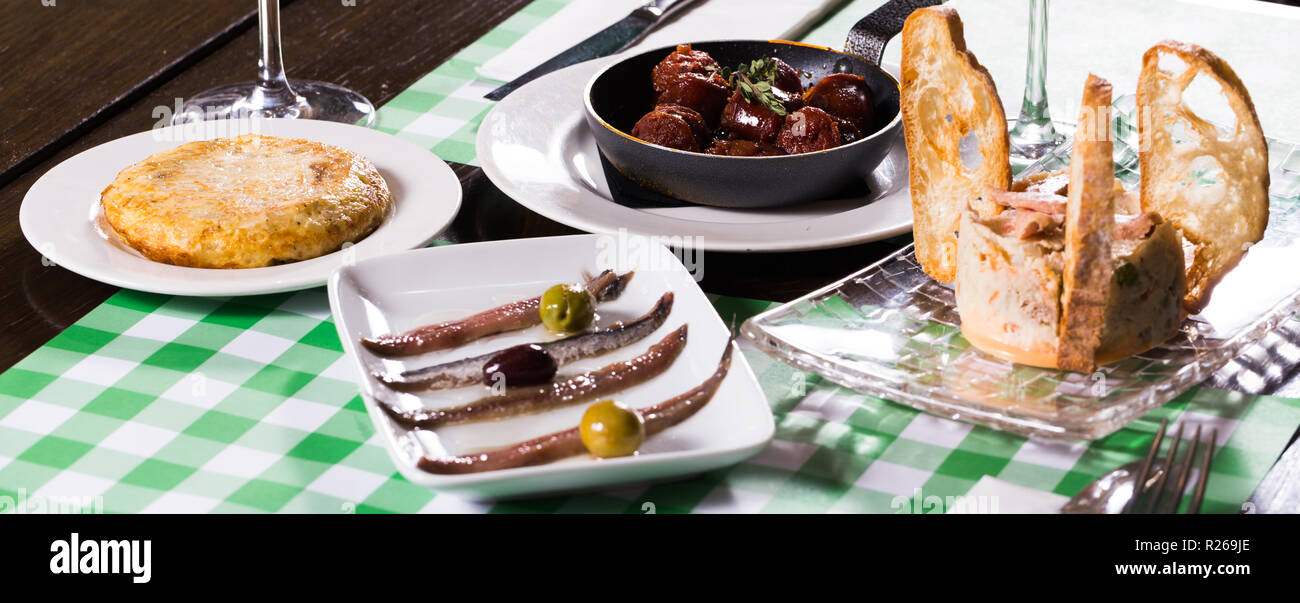 Image of set of variety dishes on the table in restaurant Stock Photo ...