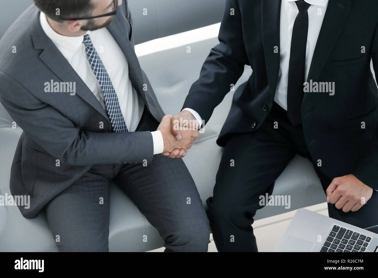 handshake Manager and the client Stock Photo - Alamy