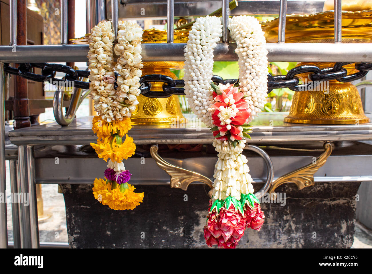 Buddhist flower garlands Stock Photo - Alamy