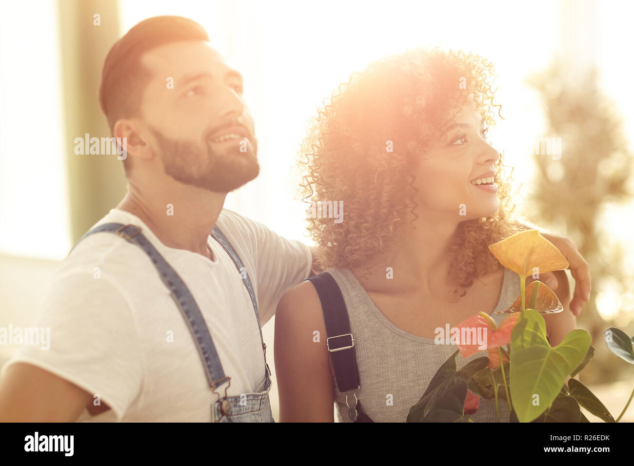 young family brings boxes with things to a new apartment Stock Photo ...