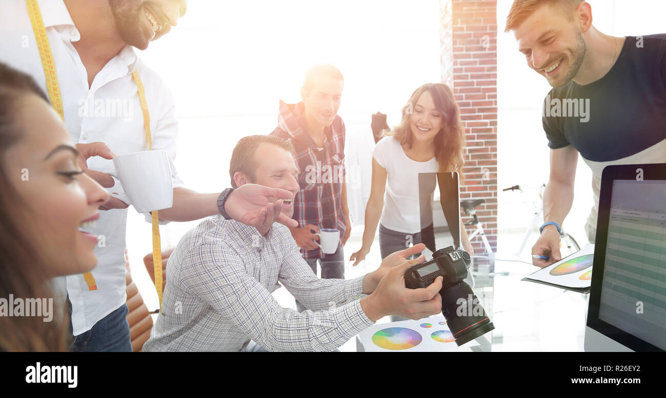 group photo of editors working in a modern office Stock Photo - Alamy