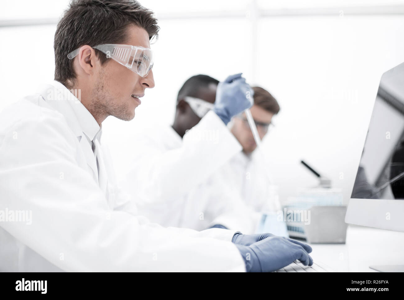Group serious scientists using hi-res stock photography and images - Alamy