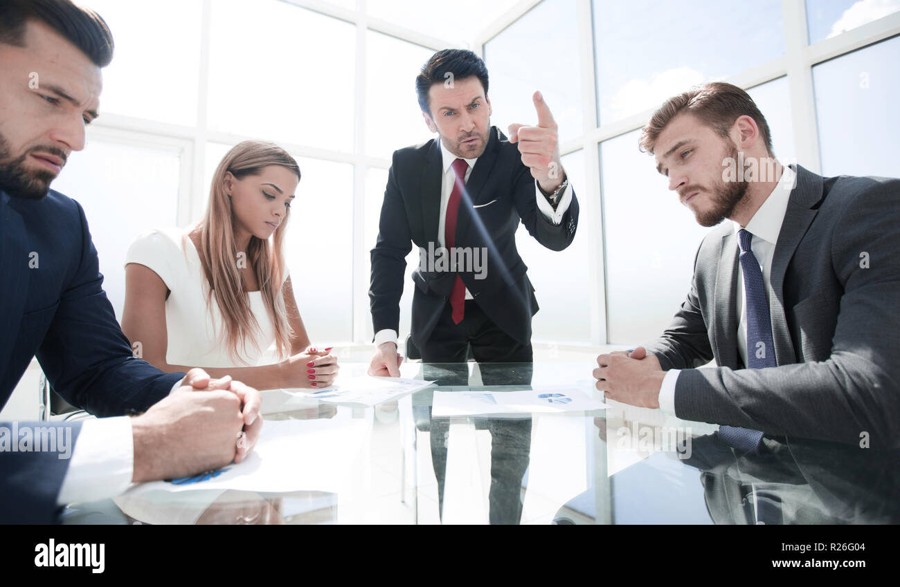 businessman makes a strict reprimand to the employee Stock Photo - Alamy