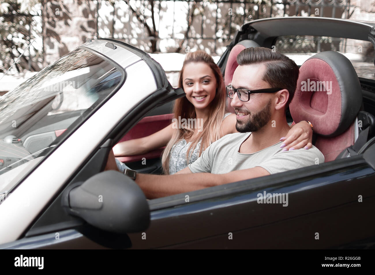 couple in love in a convertible car Stock Photo - Alamy