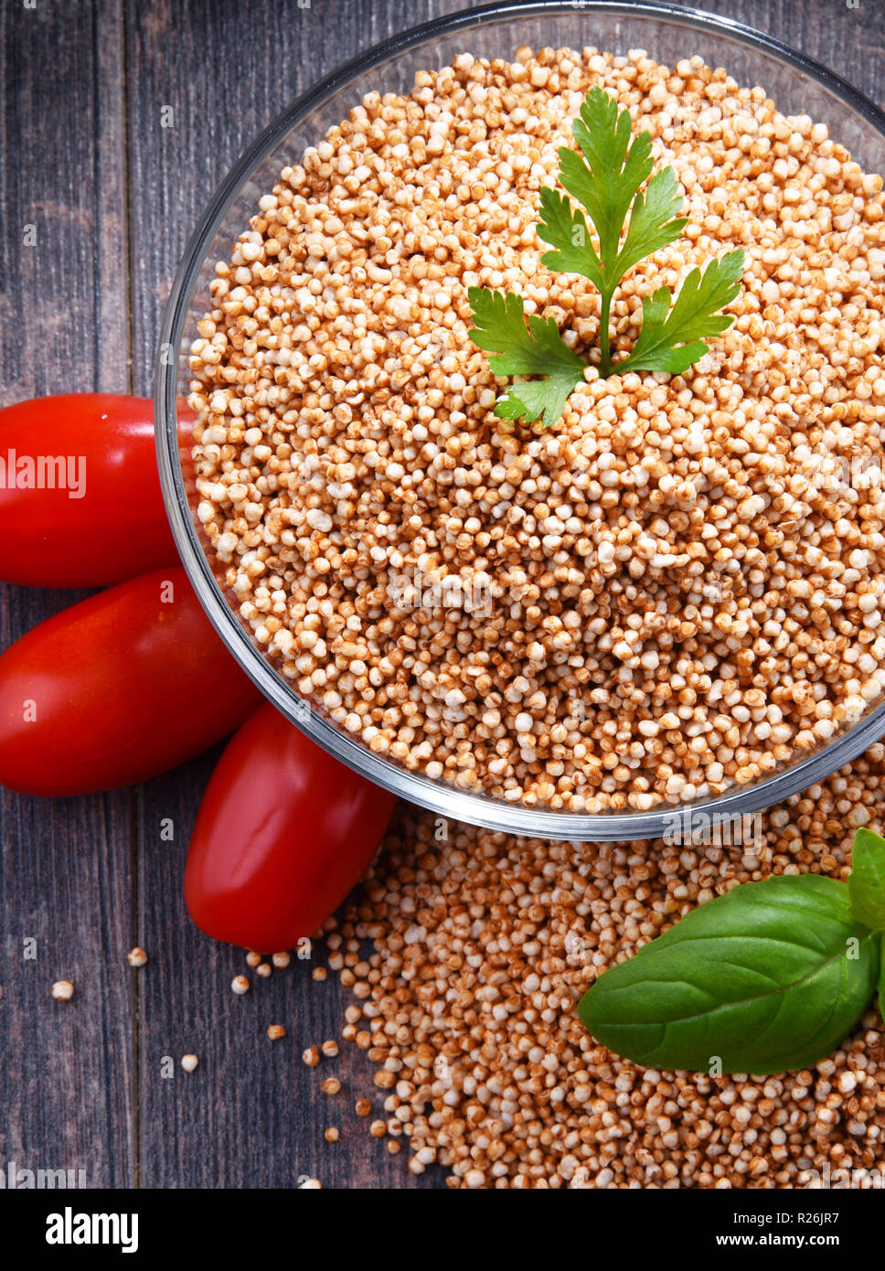 Bowl of amaranth grain on wooden table Stock Photo - Alamy