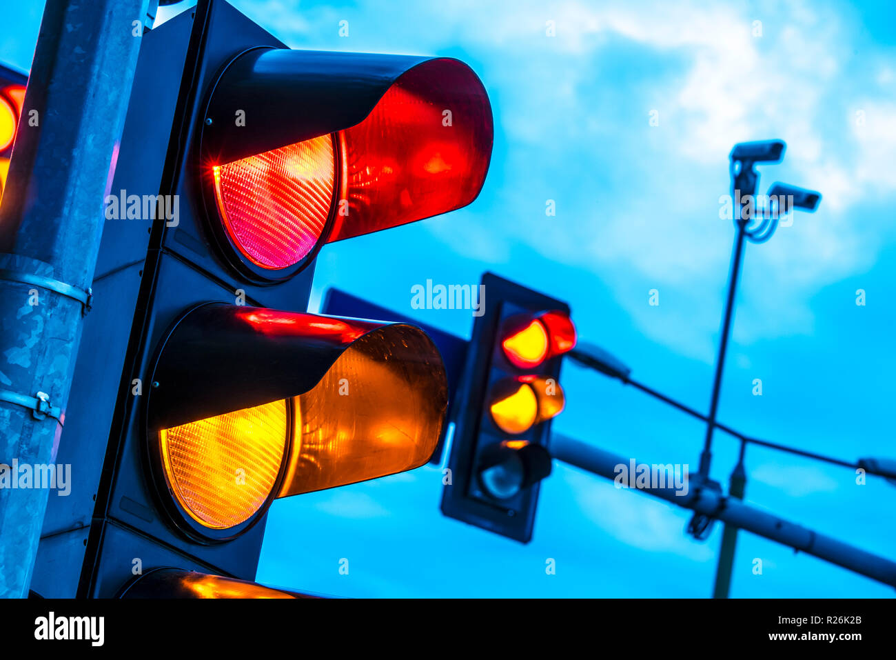 Traffic lights over urban intersection Stock Photo - Alamy