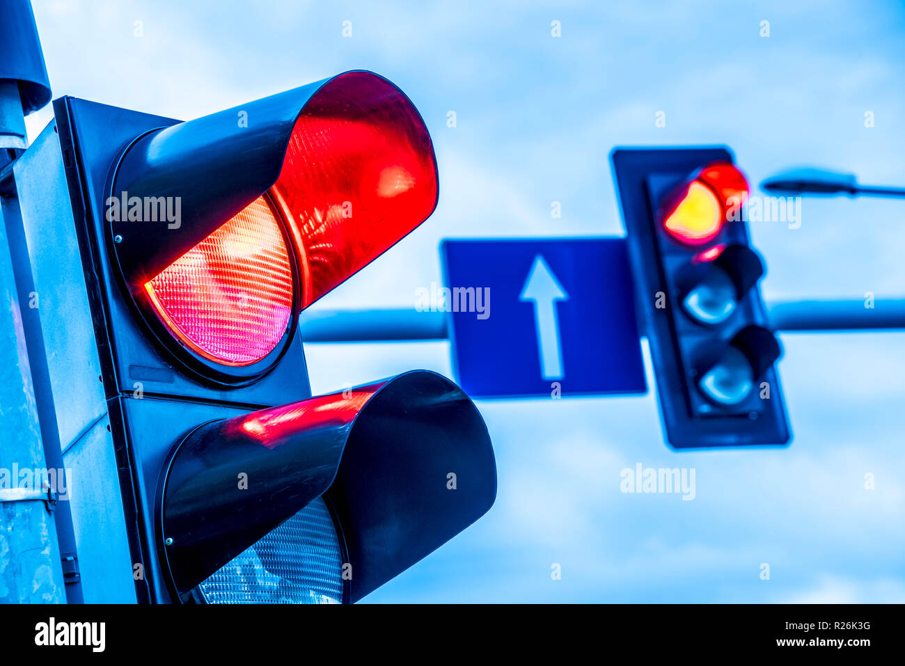 Traffic lights over urban intersection Stock Photo - Alamy