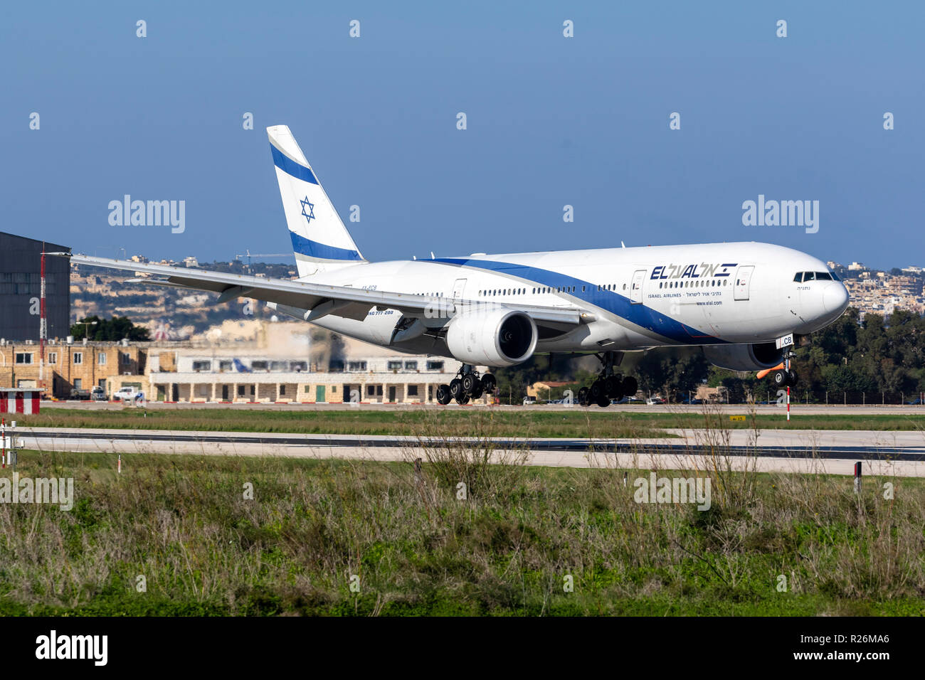 El Al Israel Airlines Boeing 777-258/ER (REG: 4X-ECB) landing runway 13 ...
