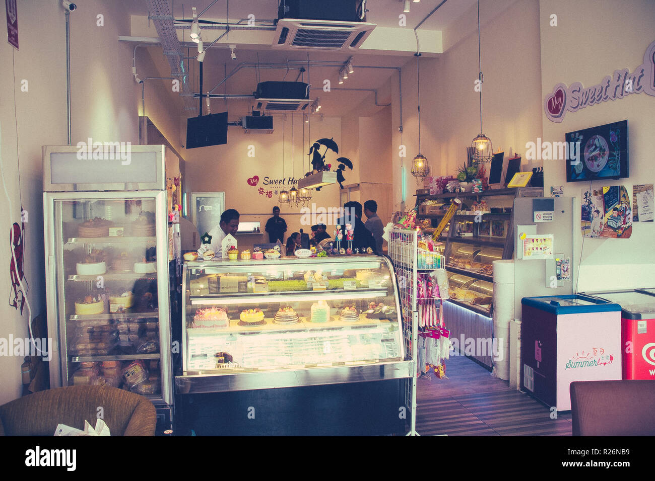 beautiful cafe and bakery with table and seating Stock Photo - Alamy