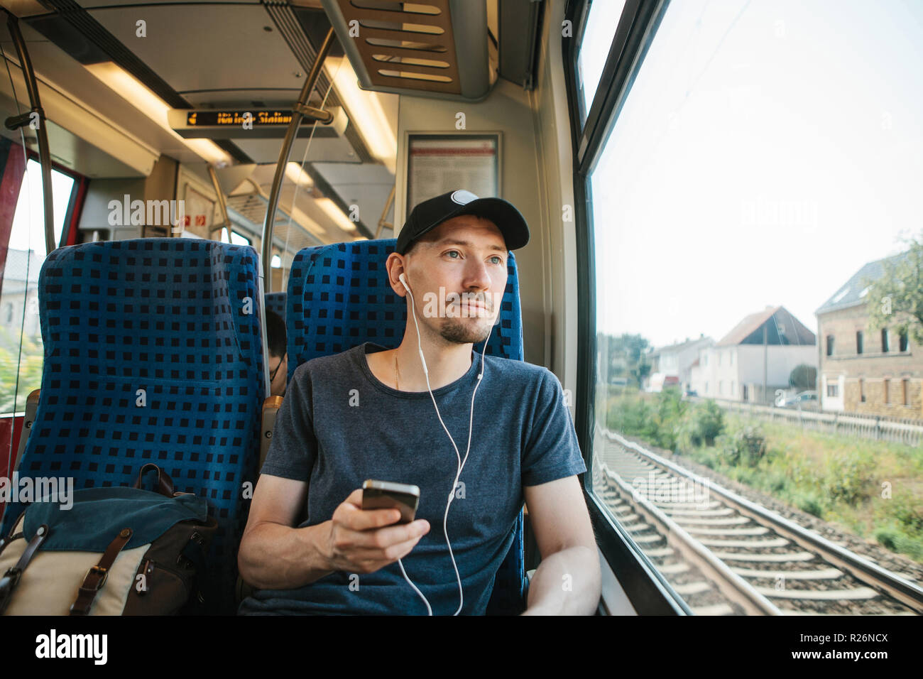 Happy train passenger traveling hi-res stock photography and images - Alamy