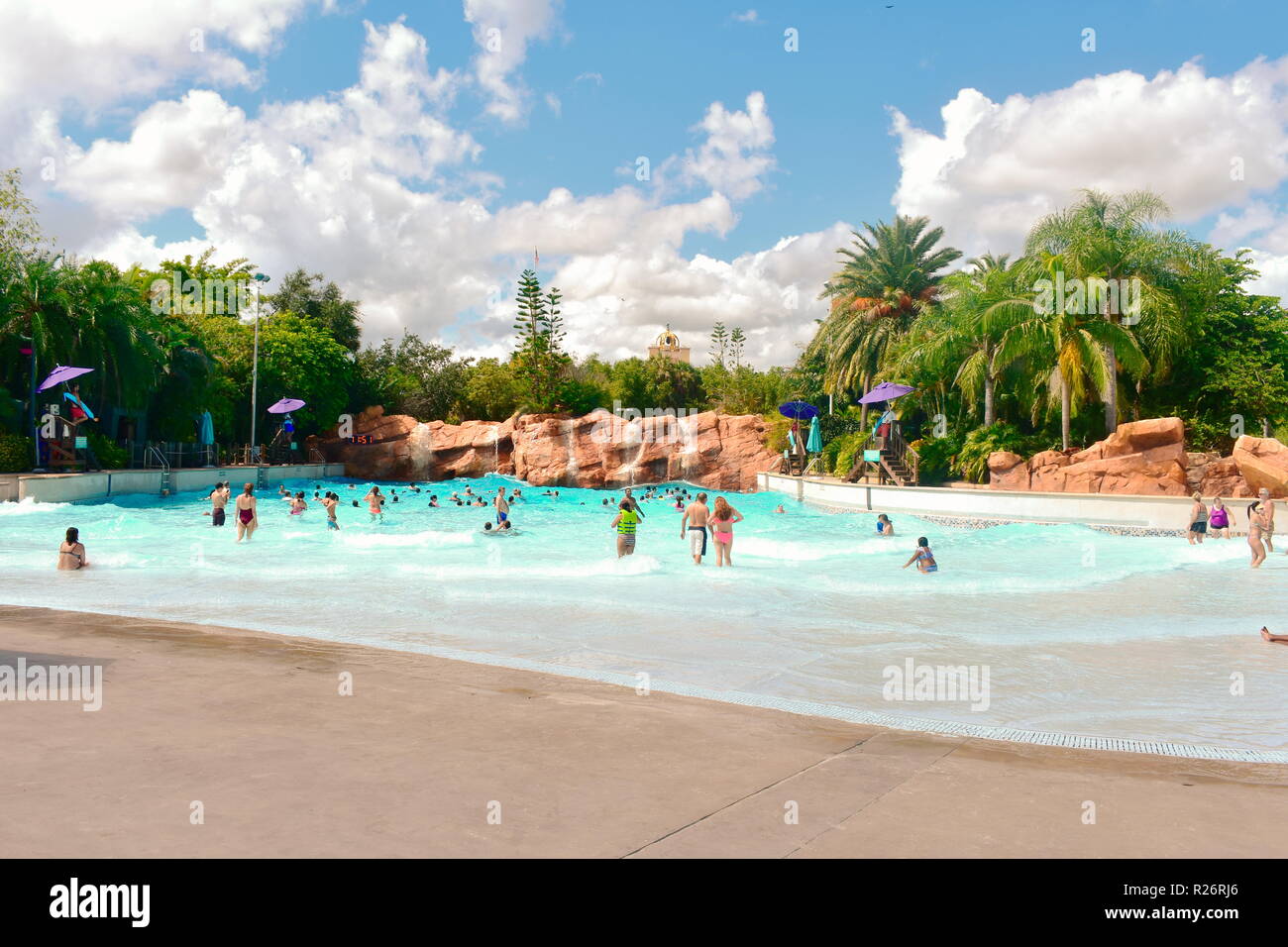 Orlando, Florida. October 26, 2018. People enjoying pool with falls on ...
