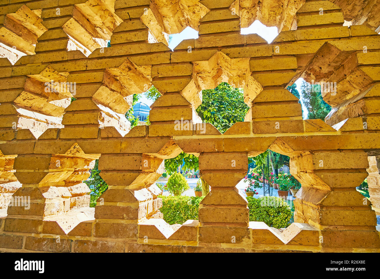 Details of the brick fence, decorated with Persian octagonal stars ...