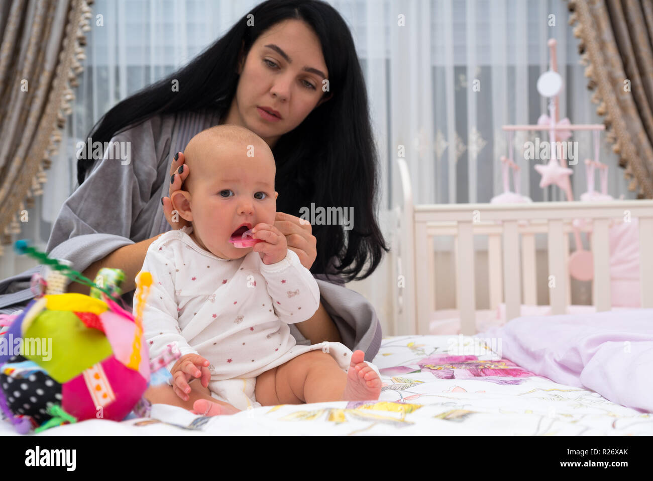 Careful dressing hi-res stock photography and images - Alamy