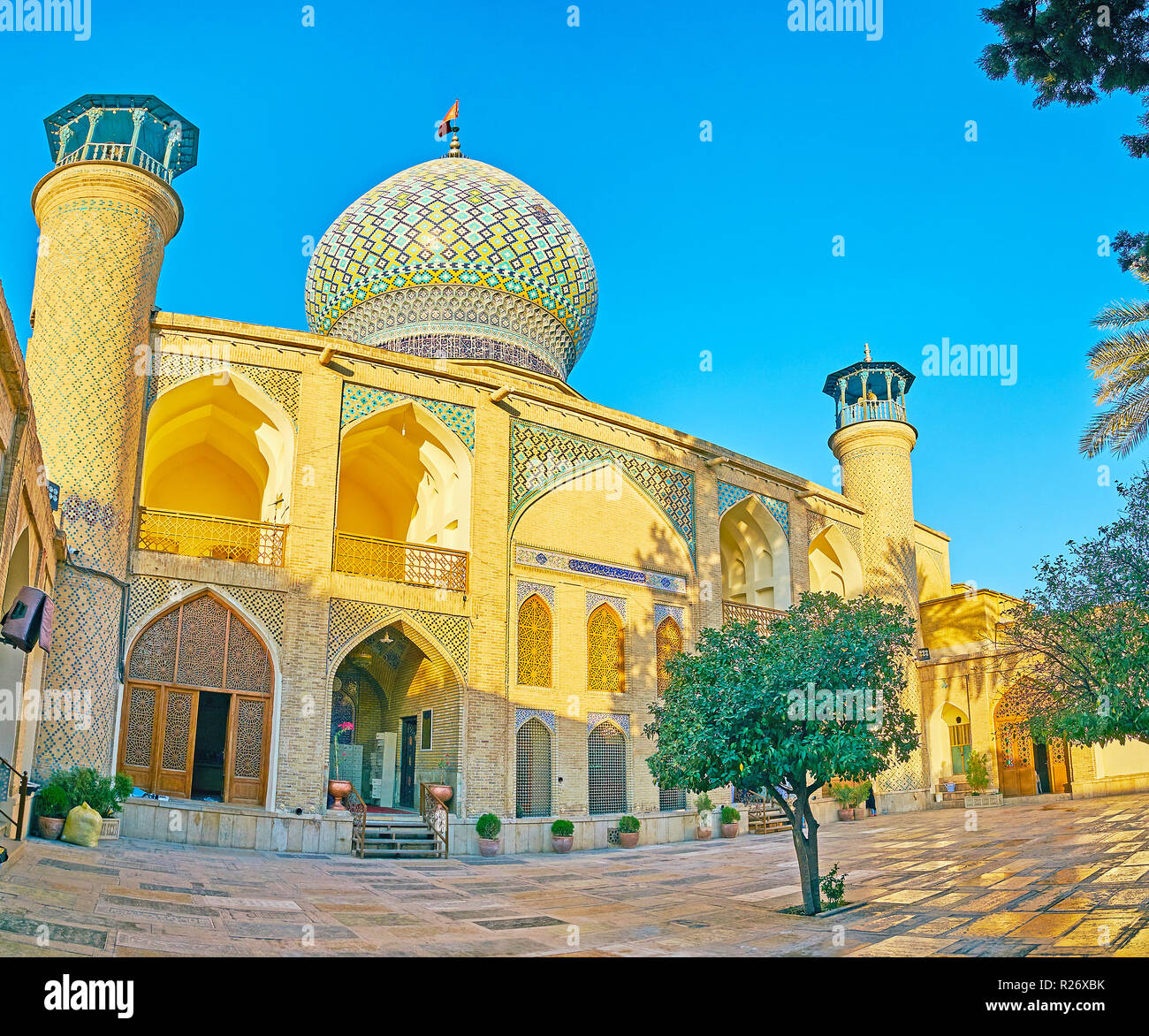 The ornate facade of Imamzadeh Ali Ibn Hamzeh Holy Shrine - the famous ...
