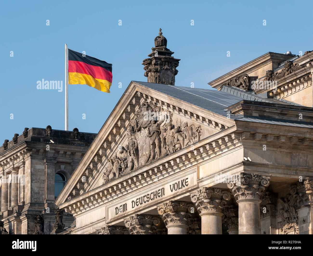Politics Concept: German Flag Upon The Reichstag Building In Berlin ...