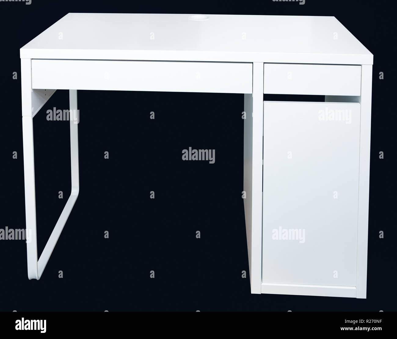 A modern computer table for working in offices, isolated on the black ...