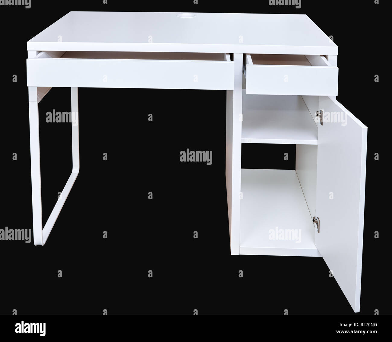 Office desk with one cabinet with an opened door and two drawers ...