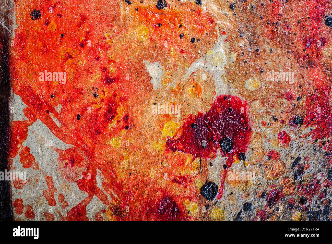 Yellow brown and red messy wall stucco texture background. Decorative ...