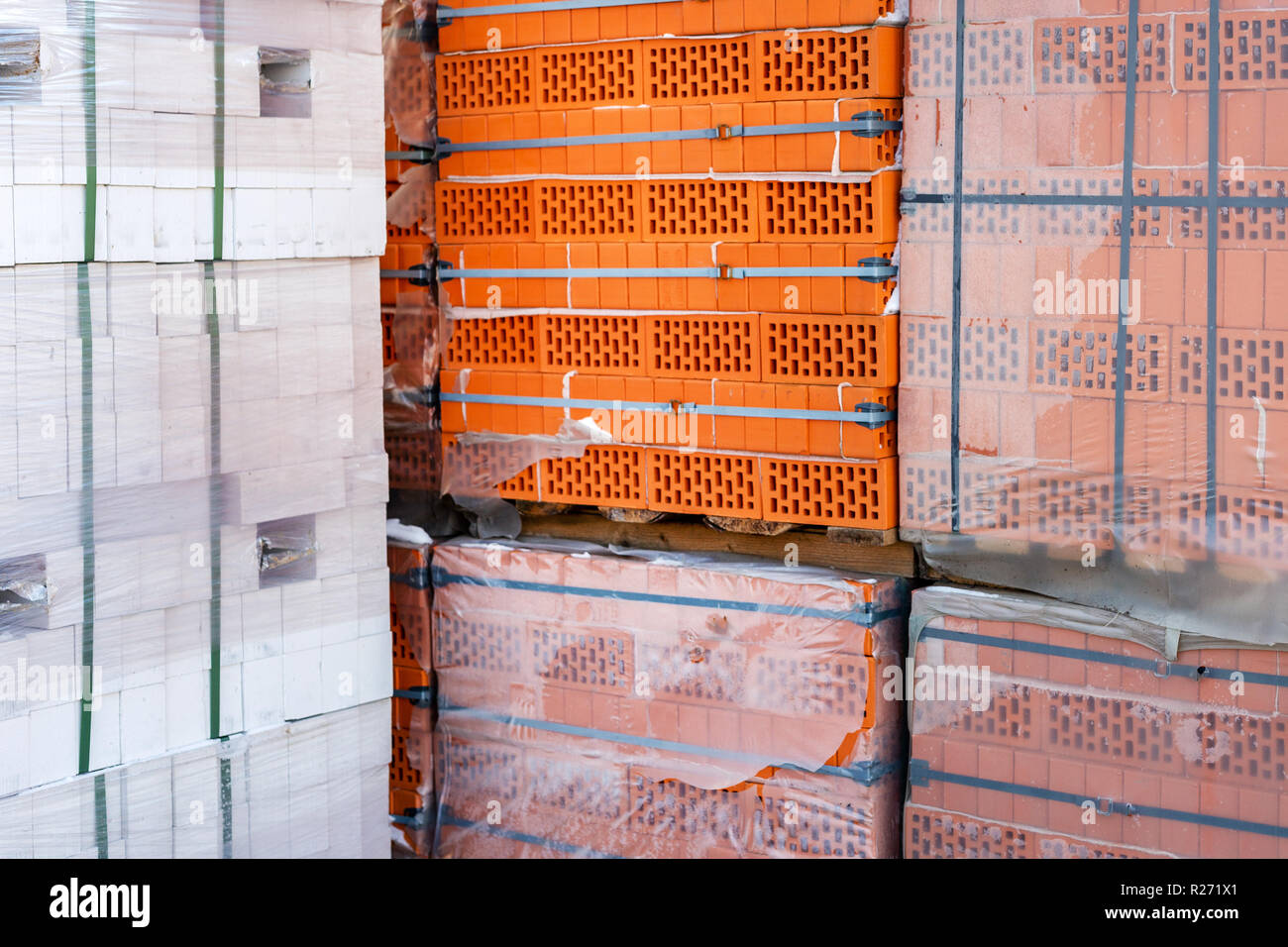 Stock pallets of red bricks wrapped in stretch film at wholesale ...