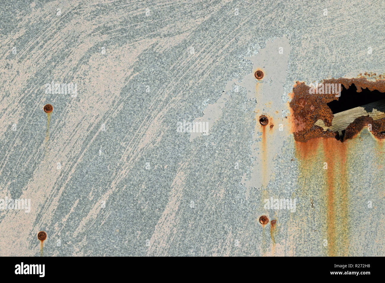 Weathered metal surface with smudged paint and rust. Background texture ...