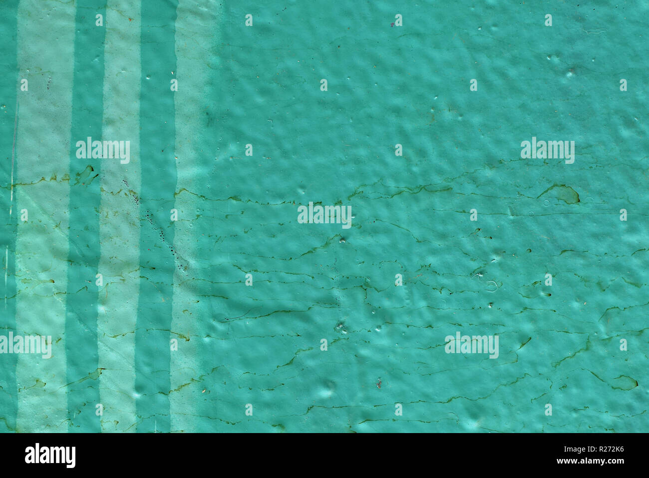 Painted lines on dirty green wall surface. Abstract background Stock ...