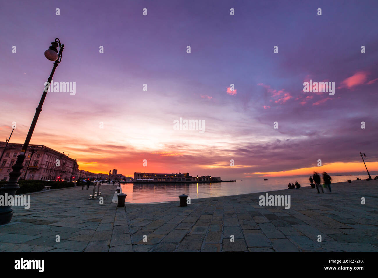 The Molo Audace pier of Trieste in a winter evening Stock Photo - Alamy