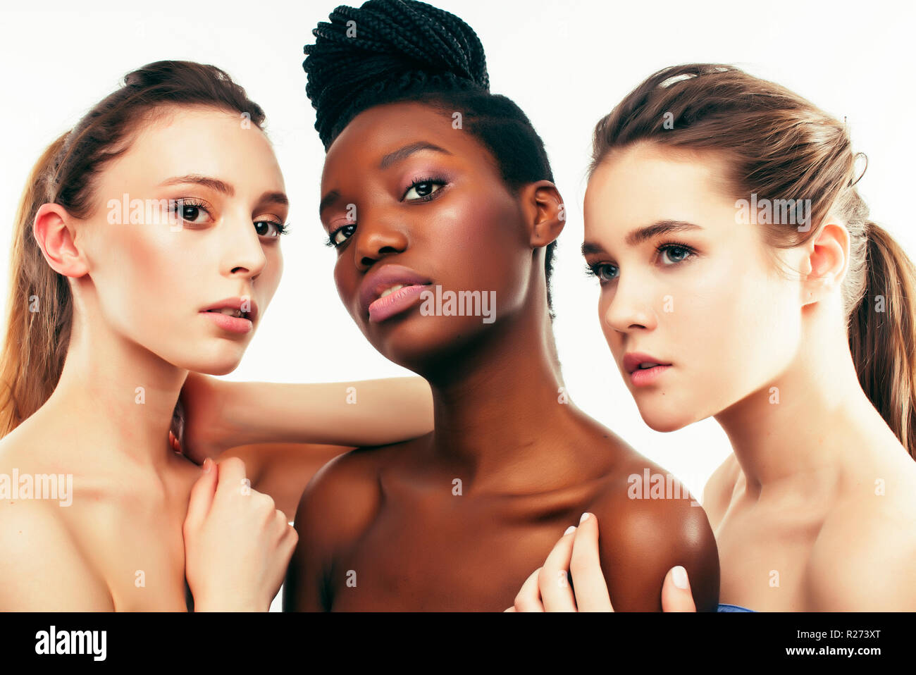 three different nation woman: african-american, caucasian togeth Stock ...
