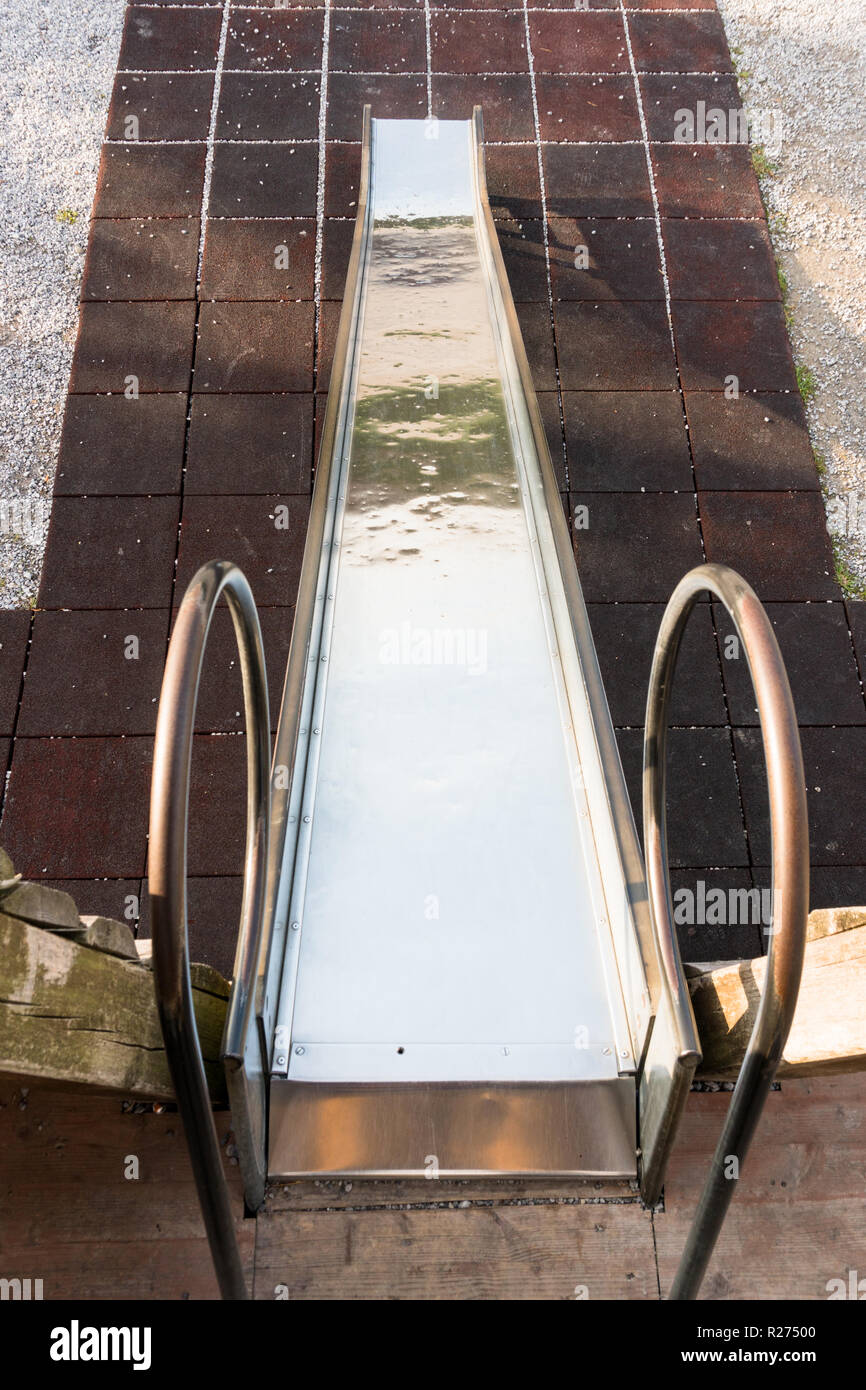 Going down the slide hi-res stock photography and images - Alamy