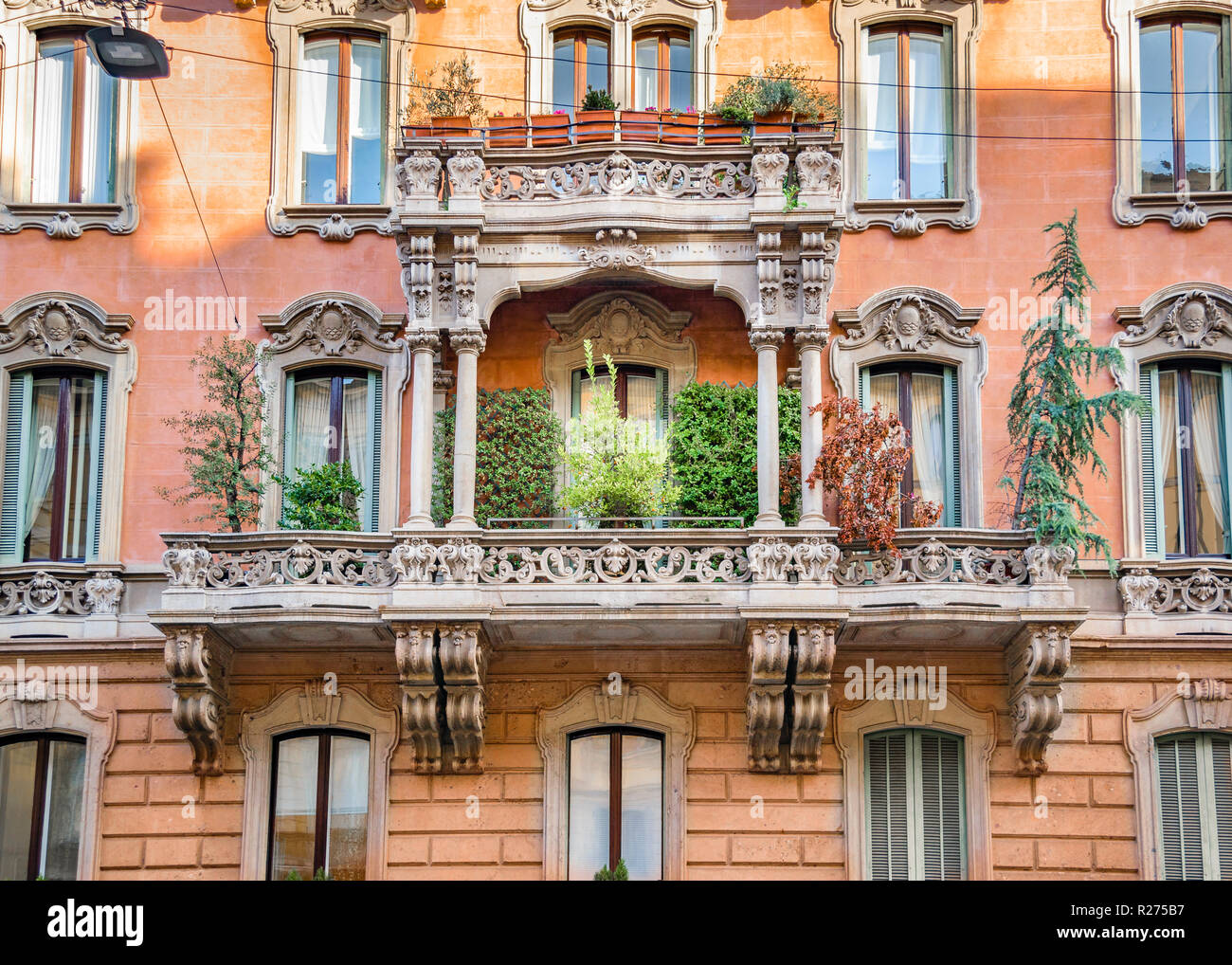 Exterior facade elegant old style apartment buildings at milan city ...
