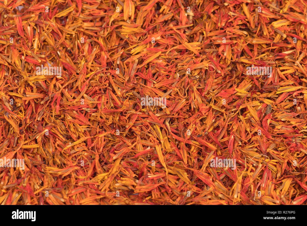 Dried safflower background Stock Photo - Alamy
