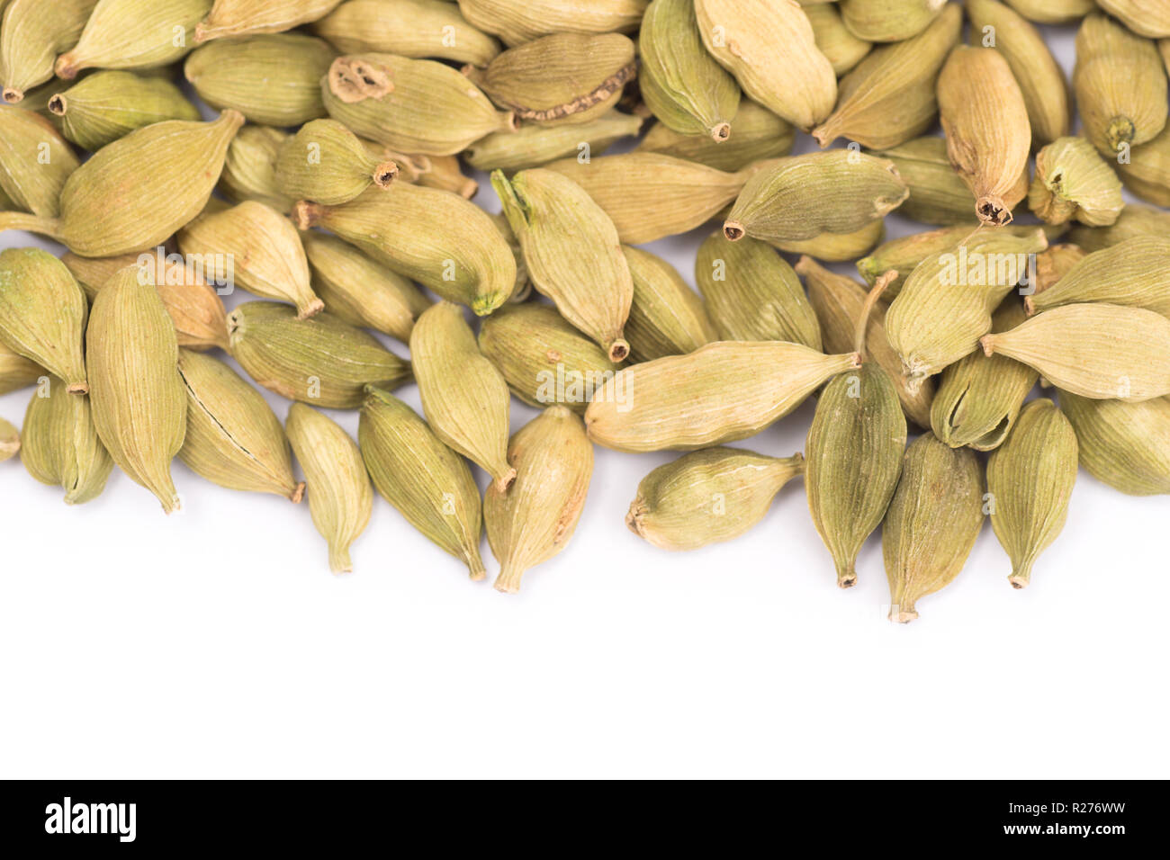 Pile of green Cardamom, cardamon isolated on white background (dried ...