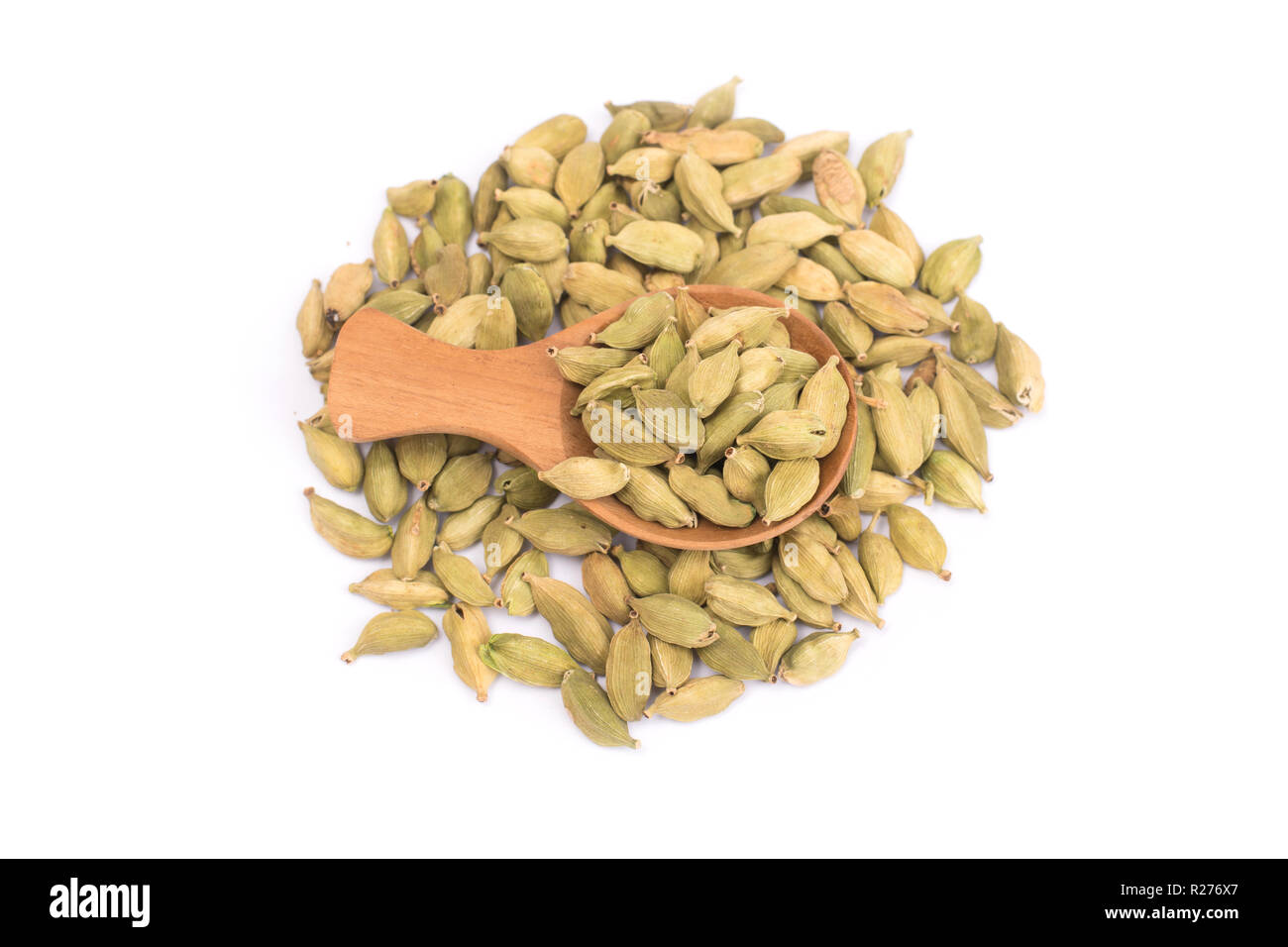 Pile of green Cardamom, cardamon or cardamum isolated on white ...
