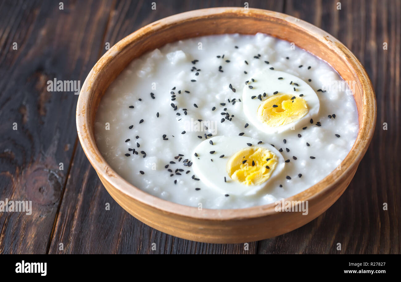 Bowl of congee - Asian rice porridge Stock Photo - Alamy