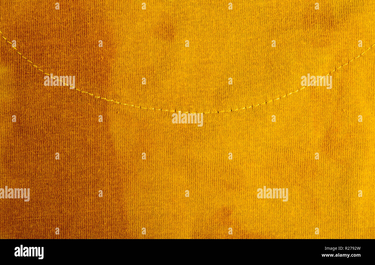 clothing items washed cotton fabric texture with seams, macro, close-up ...