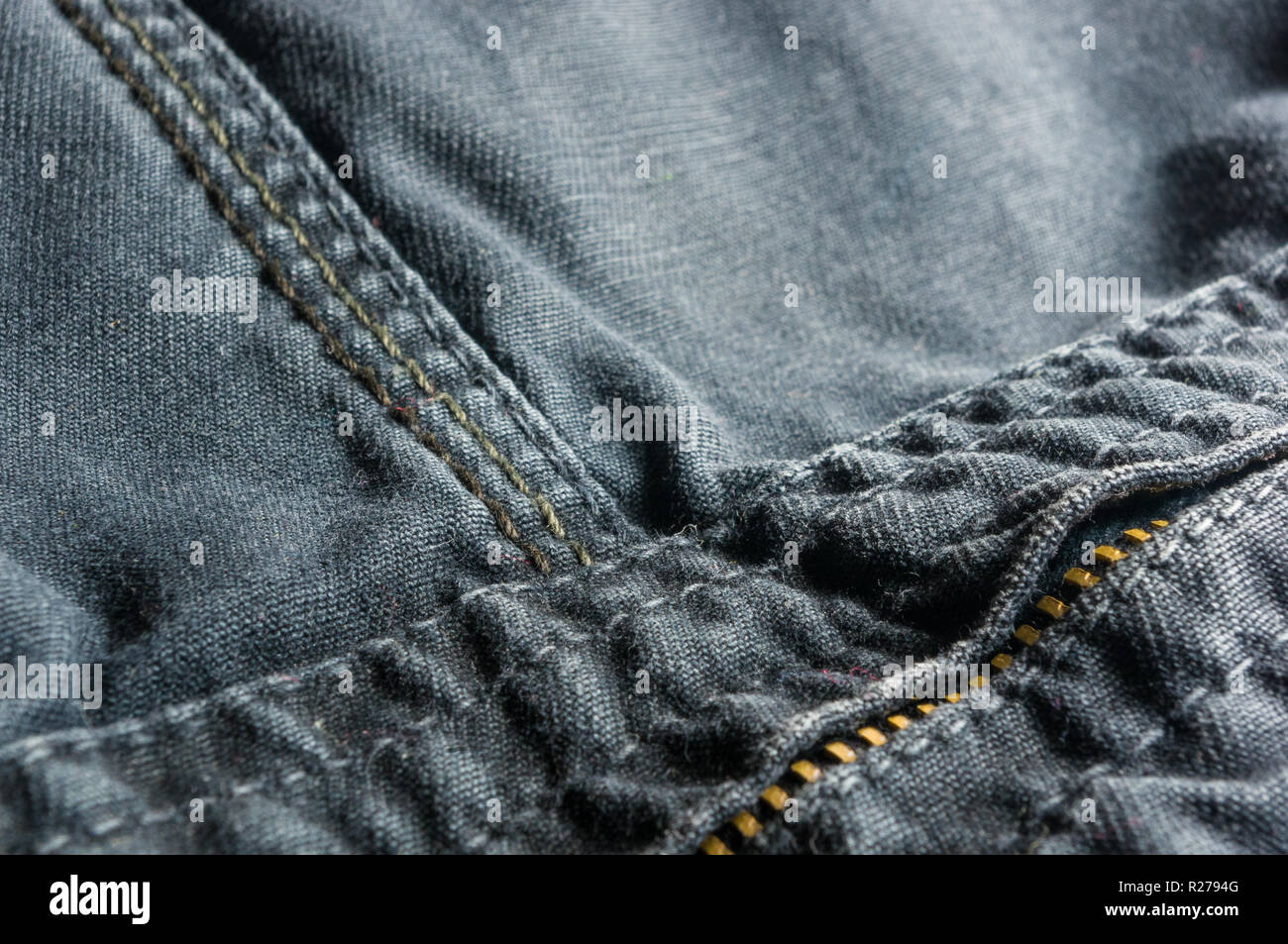 clothing items washed cotton fabric texture with seams, clasps, buttons ...