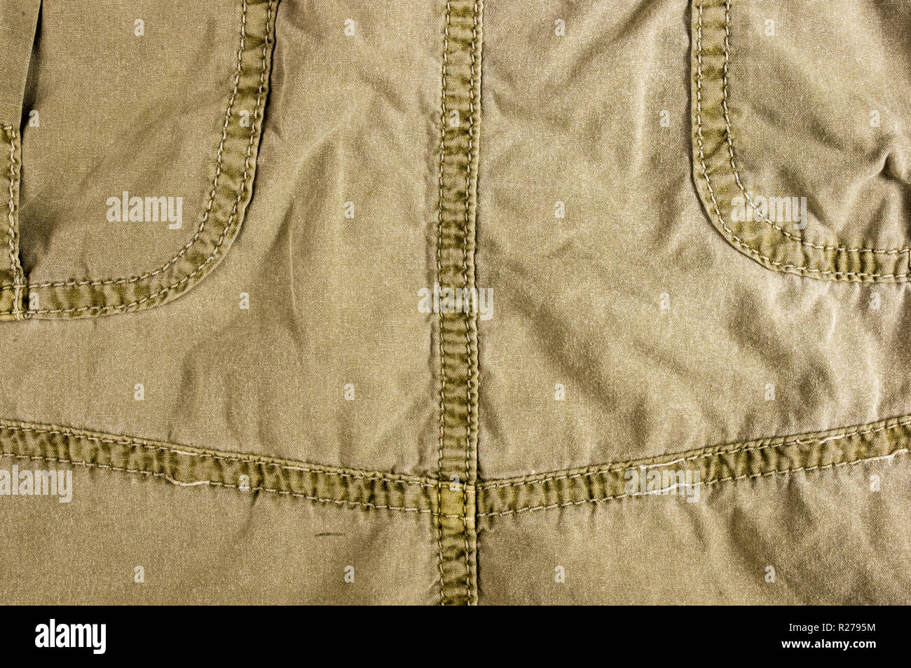 clothing items washed cotton fabric texture with seams, macro, close-up ...