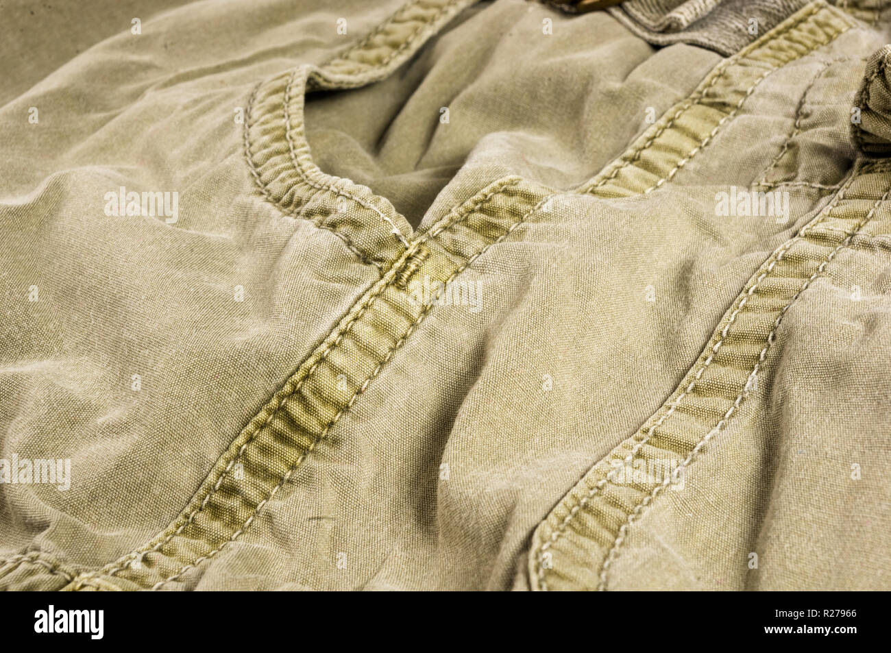 clothing items washed cotton fabric texture with seams, macro, close-up ...