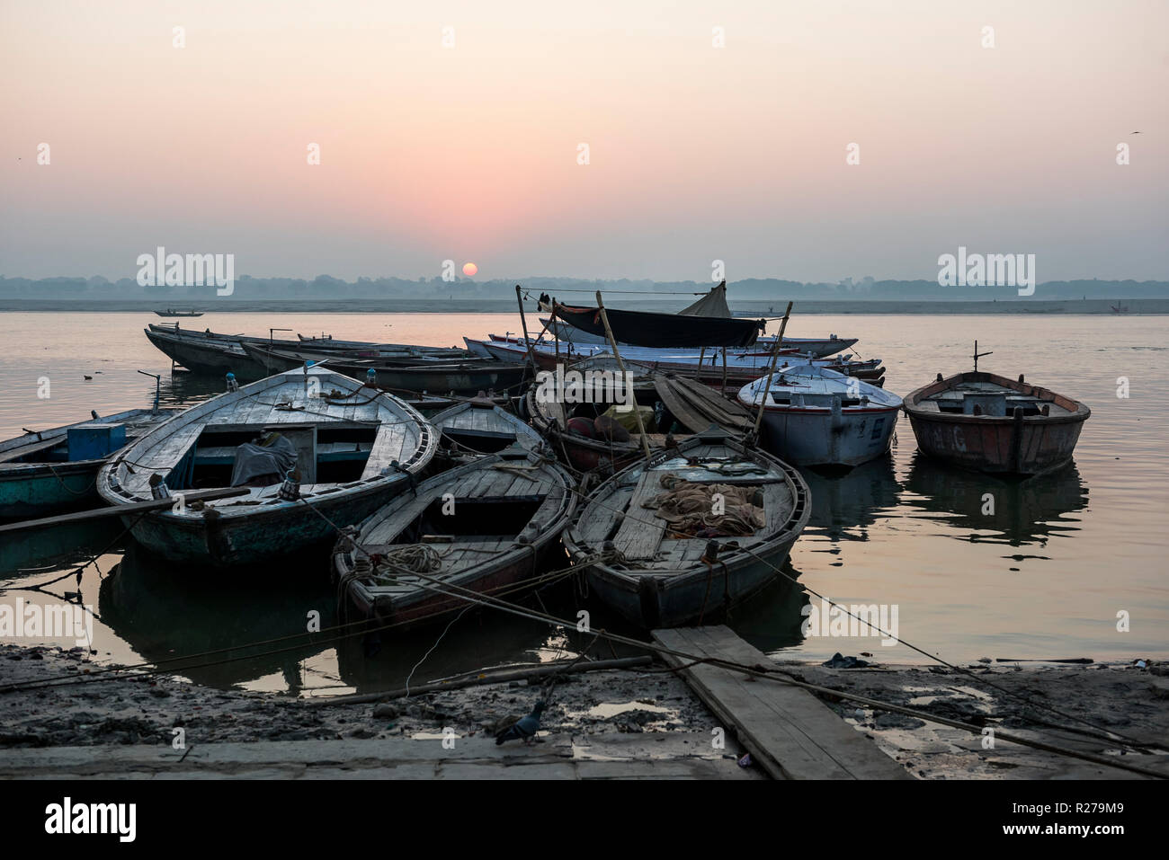 Boats along the riverside of the Ganges in Varanasi , India Stock Photo ...