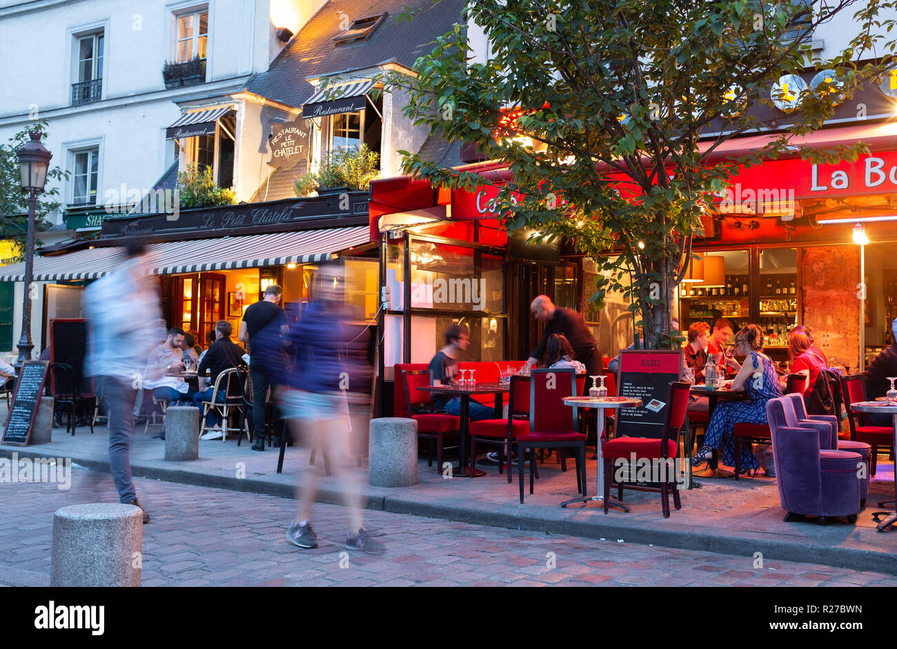 Exterior view of restaurants in Quartier Latin at dusk, Paris, France ...