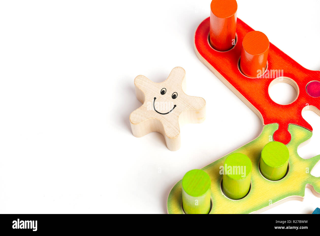 Game colored wooden blocks. Sorter The development of size, color Stock ...