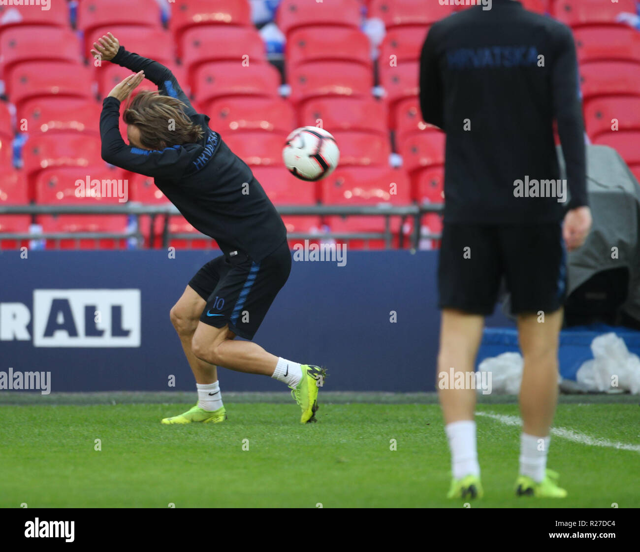 Croatia's Luka Modric reacts with a flying ball during the training ...