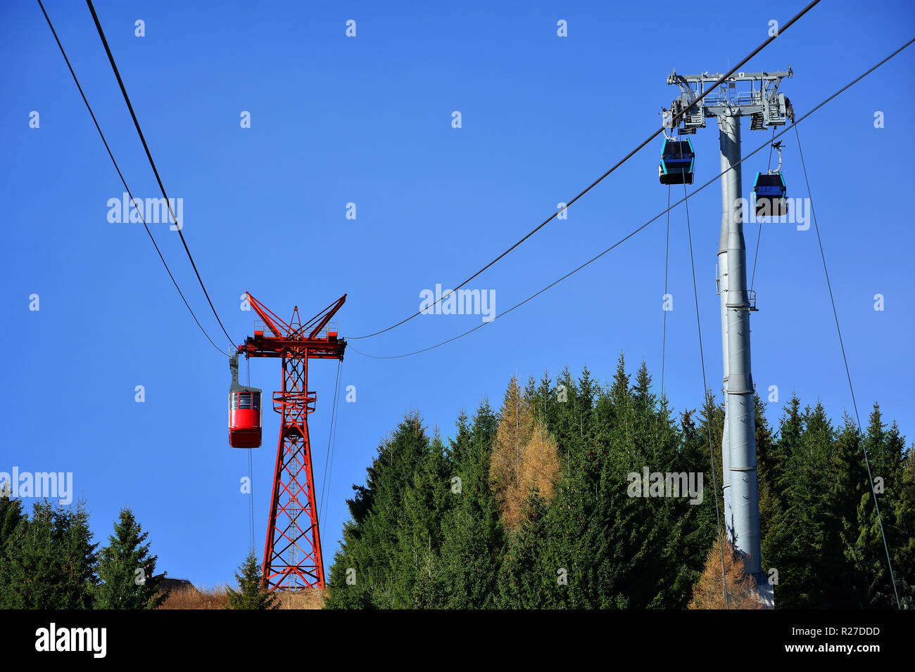 Red cable car and gondola ride transportation at 2000m in Bucegi ...