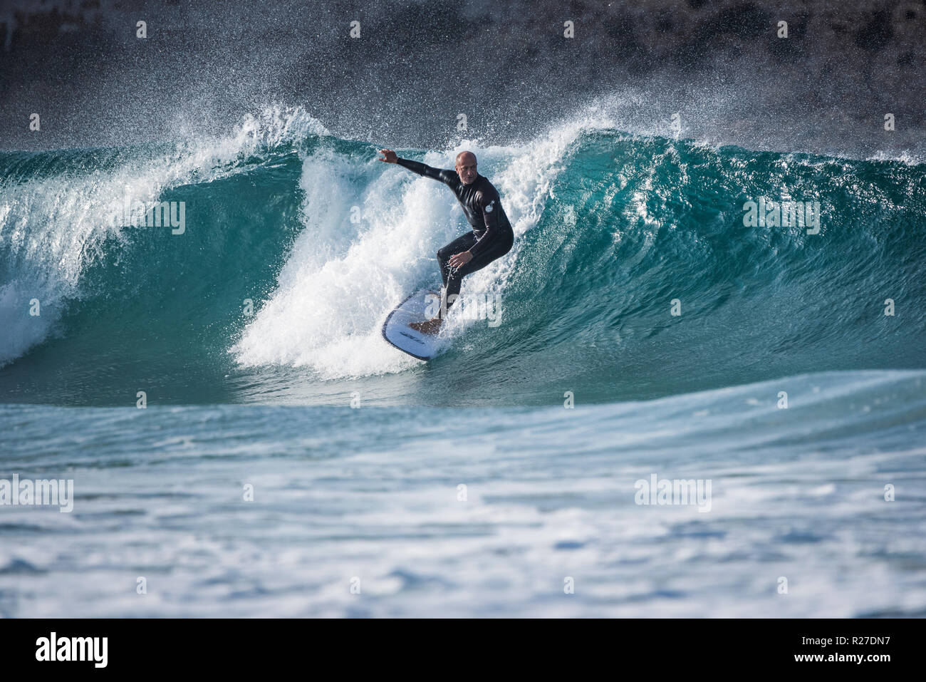 Surfer in action Stock Photo - Alamy
