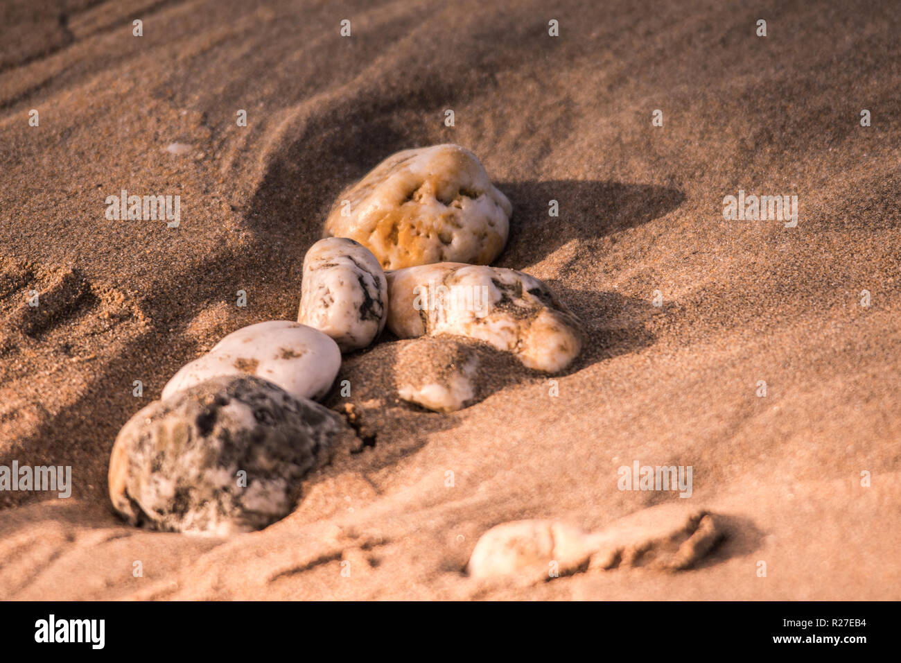 Sand and pebble rocks Stock Photo - Alamy