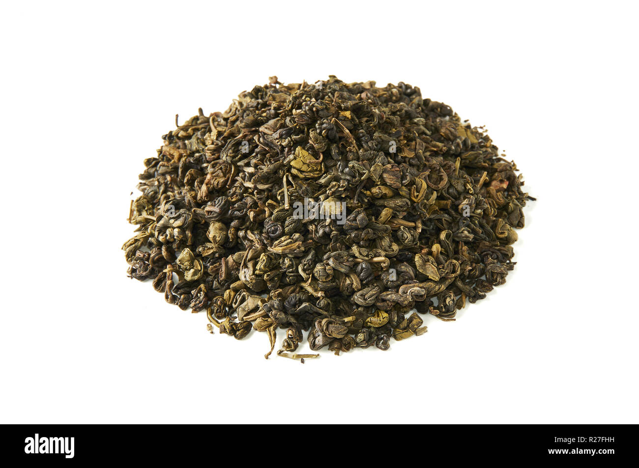 A pile of dry green tea. Isolated on white background Stock Photo - Alamy