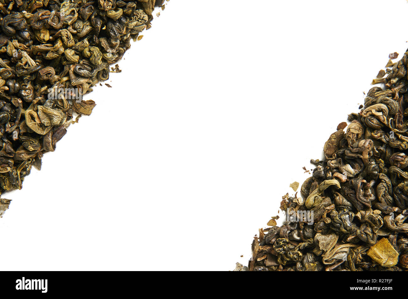 A pile of dry green tea. Isolated on white background Stock Photo - Alamy