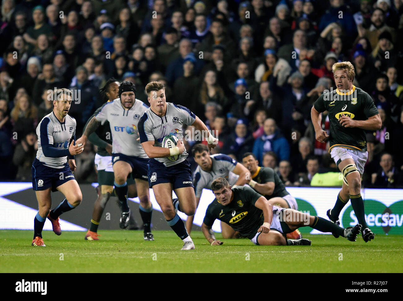 Huw Jones of Scotland makes break in the run up to the first Scotland ...